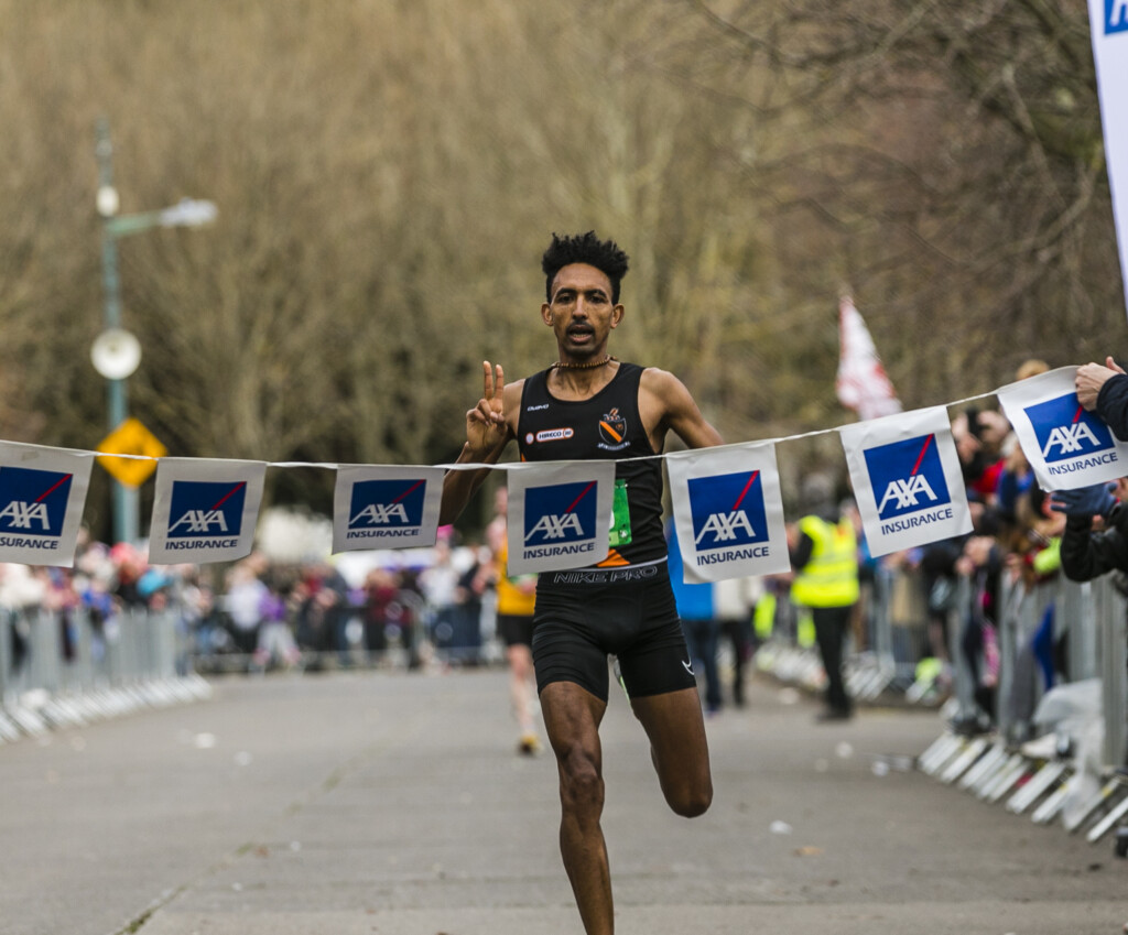 Efrem Gidey crosses the line to win the AXA Raheny 5