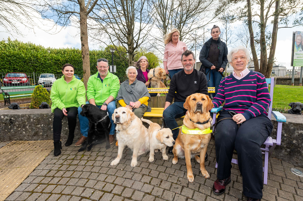 Roy Keane pictured with clients, volunteers and staff