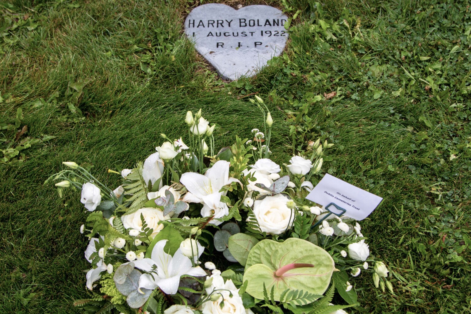 The gravestone of Harry Boland. The stone heart was placed by his ...