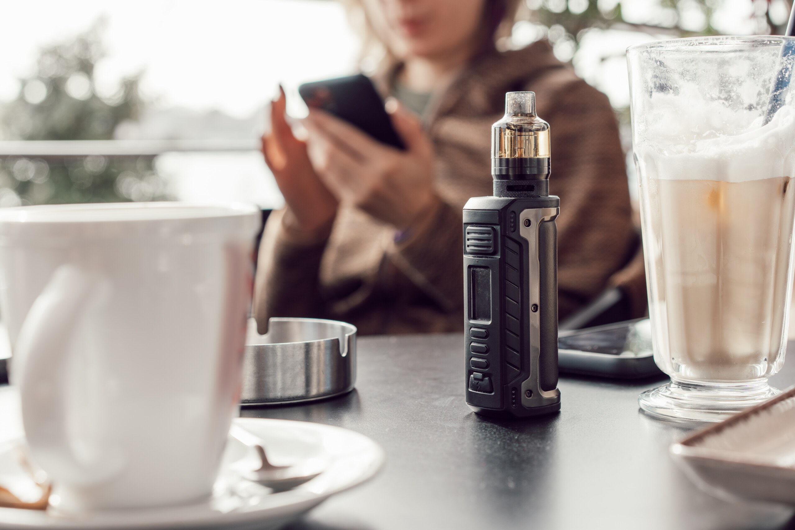 bigstock-Vape-Stands-On-A-Wooden-Table-471609657-scaled.jpg