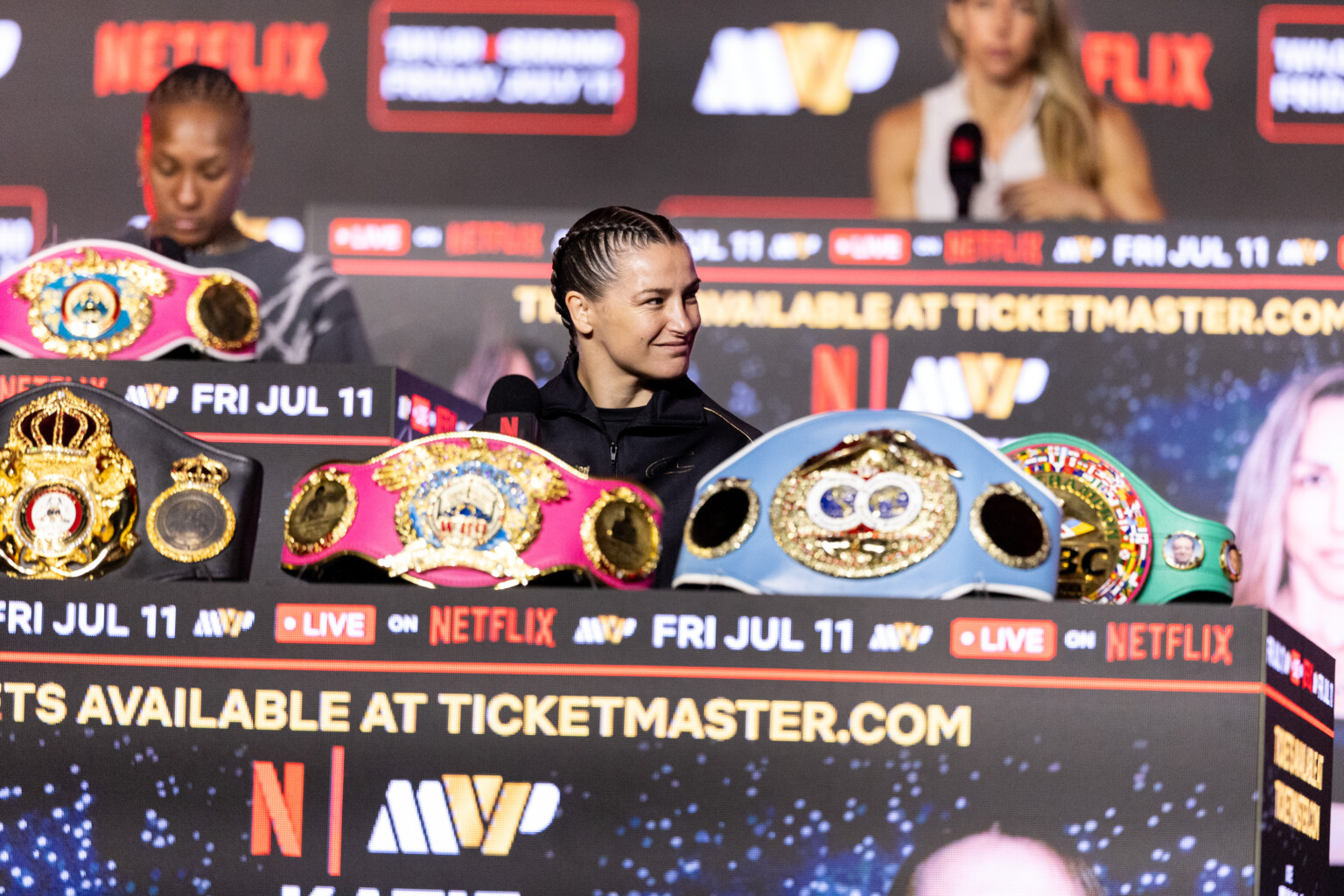 Taylor, coming into the fight with a 2-0 record against Serrano, was in ...