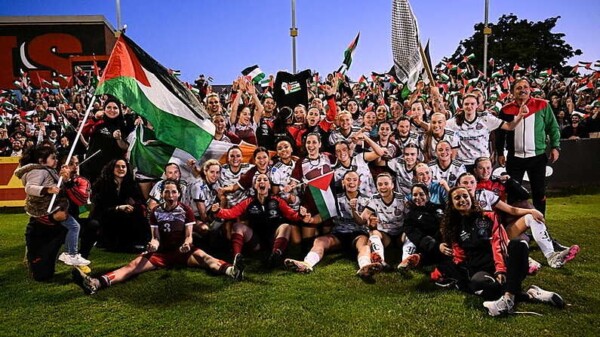 Players from Bohs and Palestine on the pitch following their solidarity ...