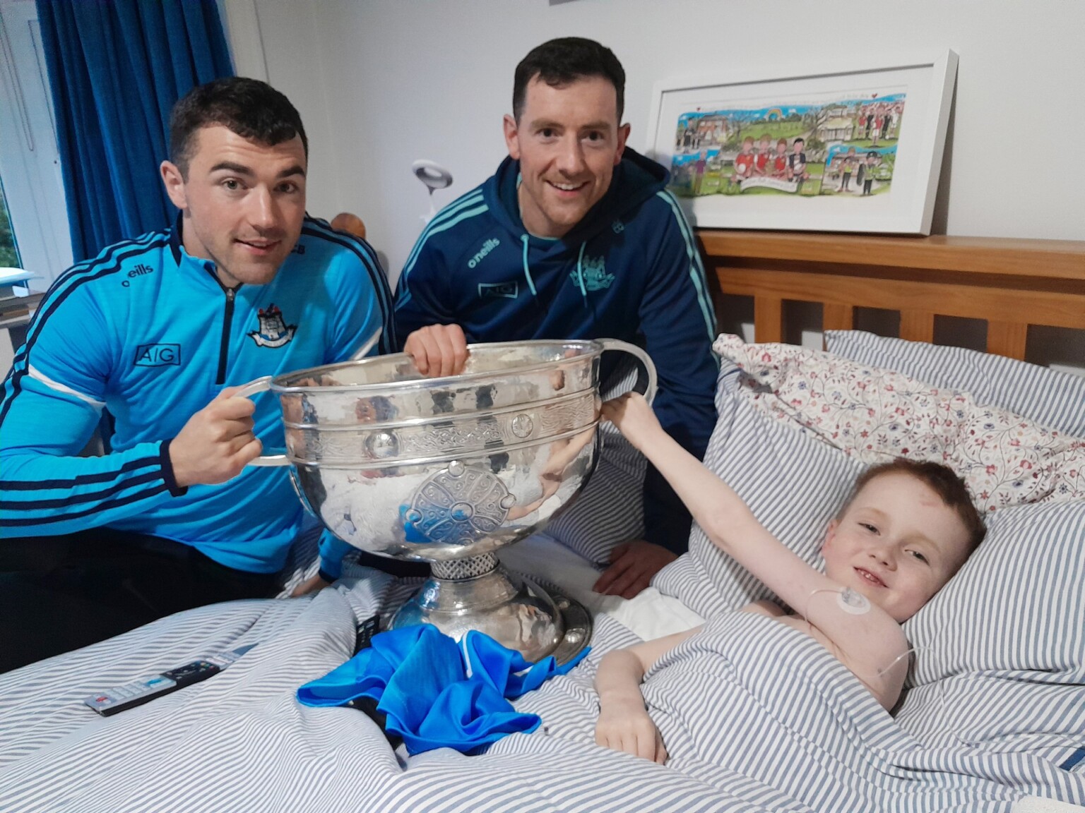 Colm and Ryan Basquel pictured with Michael Horgan